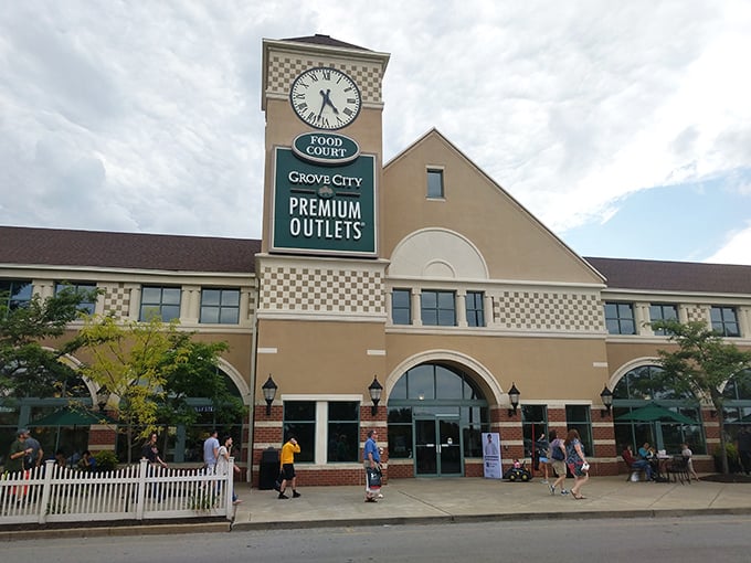 The iconic clock tower stands like a beacon for bargain hunters across Pennsylvania's shopping landscape.