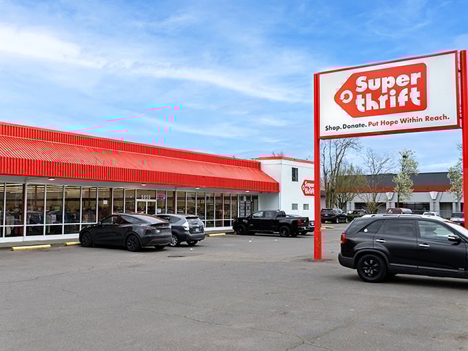 SuperThrift's iconic red roof and signage stand out like a beacon of bargain hope against Portland's sky – a siren call to thrift enthusiasts everywhere.