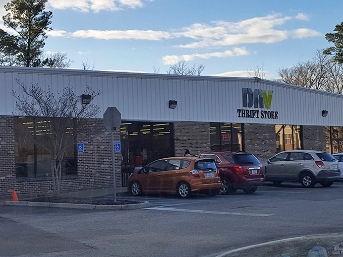 The unassuming exterior of DAV Thrift Store—where bargain hunters' dreams come true and wallets breathe sighs of relief.