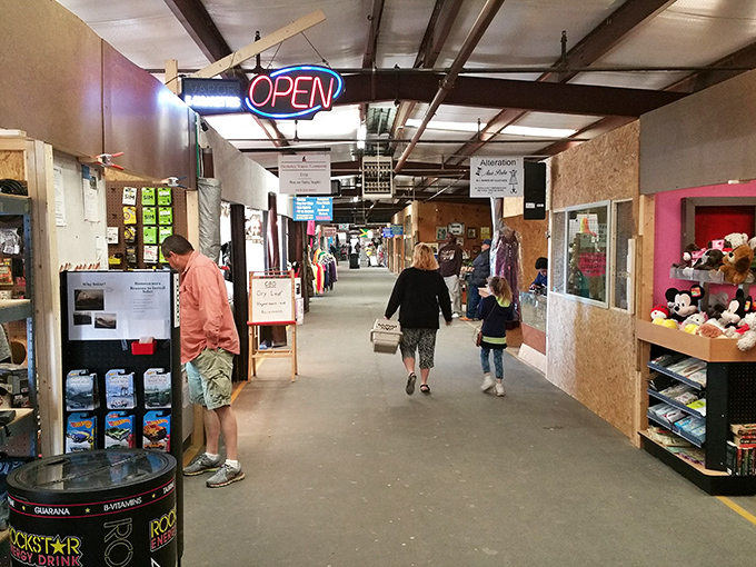 Treasure hunters navigate the covered walkways of Coastal Carolina Flea Market, where every aisle promises unexpected discoveries and memorable encounters.
