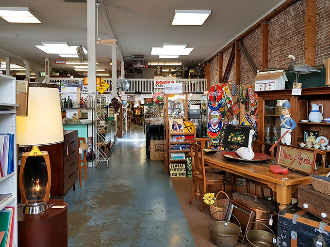 Step inside Whistlestop Antiques, where every corner overflows with vintage charm—from mid-century lamps to nostalgic Coca-Cola signs—turning treasure hunting into an art form.