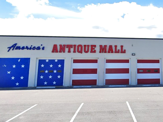 The patriotic facade of America's Antique Mall isn't subtle – it's like Uncle Sam and Betsy Ross collaborated on a warehouse makeover.