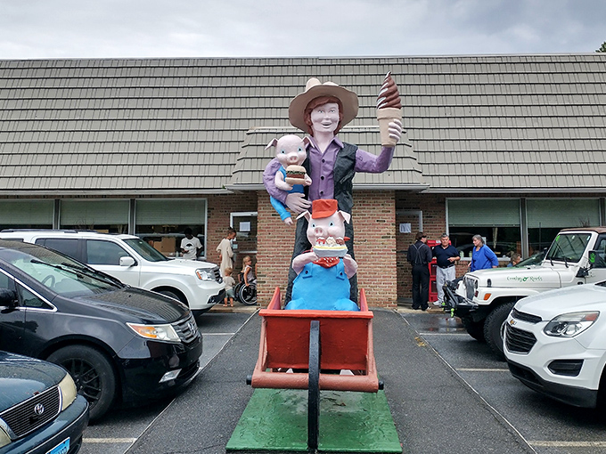 The whimsical statue outside Katie's Kitchen stands like a culinary guardian, promising homestyle delights within. First impressions matter, and this one's delightfully quirky.