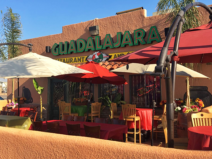 The terracotta-colored exterior with vibrant red umbrellas isn't trying to impress Instagram—it's saving its energy for what matters: the food inside.