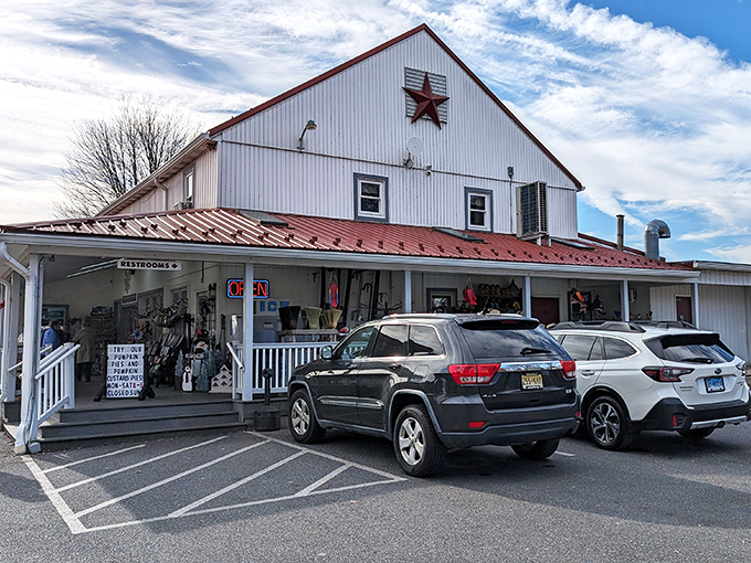 The classic white clapboard exterior with its rustic red roof and barn star isn't just Amish country architecture—it's a beacon for carb-seeking pilgrims everywhere.
