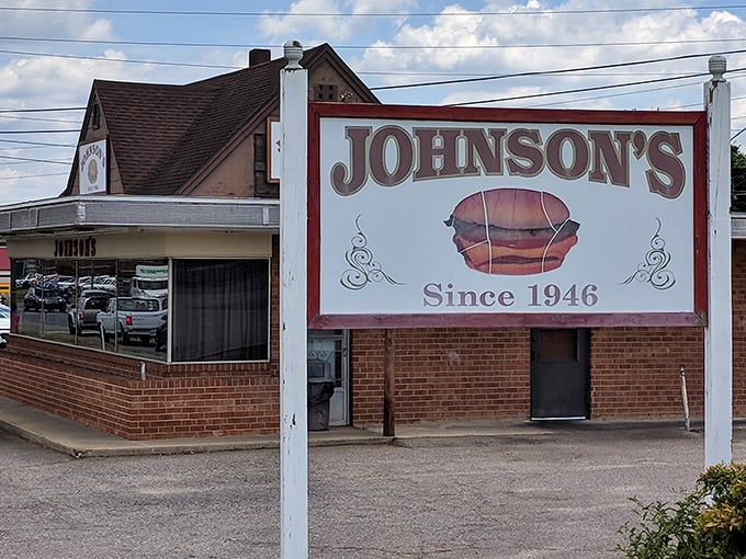 The unassuming brick exterior of Johnson's Drive-In hides culinary greatness like Clark Kent's glasses hide Superman. Worth every minute in line!