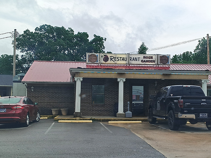 The unassuming brick exterior of Rose Garden Restaurant stands as a beacon of breakfast hope along the Tennessee highway—no fancy frills, just honest food awaiting inside.