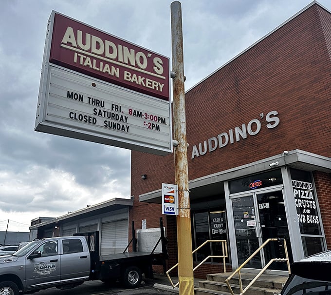 The iconic red sign of Auddino's Italian Bakery stands as a beacon of carb-laden hope on Clara Avenue. Early birds get the freshest bread!