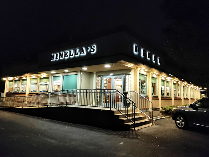 Minella's gleaming exterior stands like a beacon of comfort food hope on Lancaster Avenue, promising delicious salvation to hungry travelers day or night.
