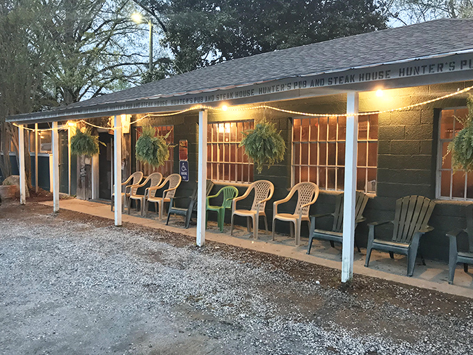 The unassuming exterior of Hunters Pub might make you drive past—don't. This modest green building houses steak paradise that locals have treasured for years.