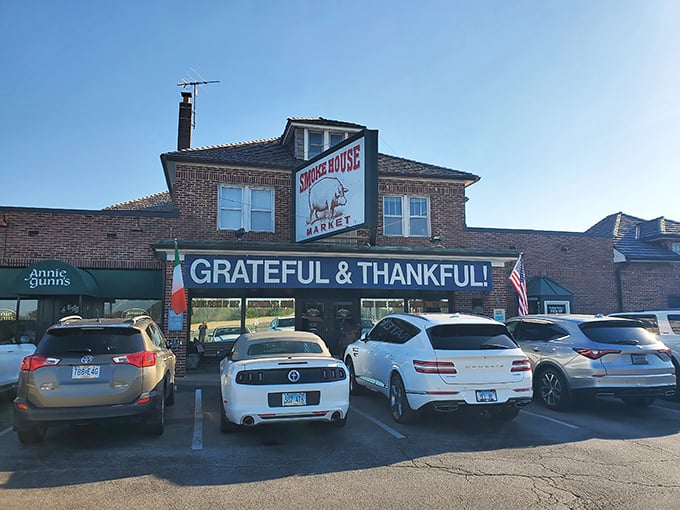 The unassuming brick exterior of Annie Gunn's proudly declares "GRATEFUL & THANKFUL" – a sentiment you'll share after experiencing what waits inside.