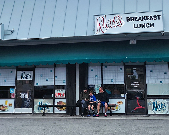 The unassuming storefront of Nat's Coffee Shop beckons with its retro charm and teal awning—proof that culinary treasures often hide in plain sight.