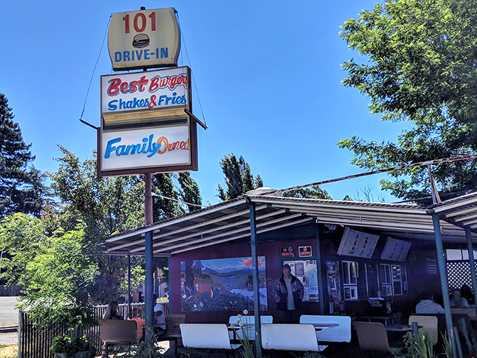 The classic red and white exterior beckons like a beacon of burger bliss along Highway 101.