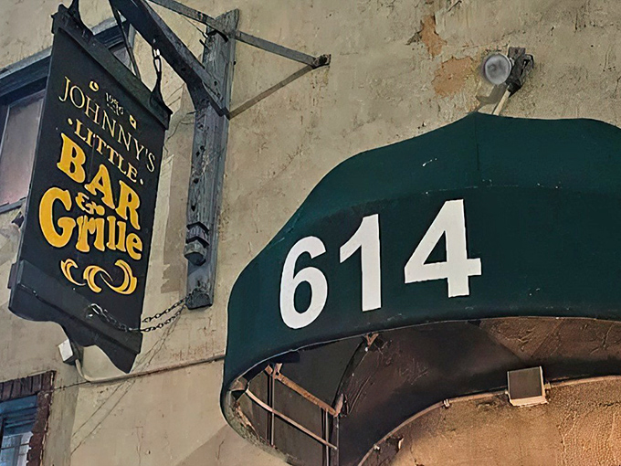 The unassuming entrance to Johnny's Little Bar might be Cleveland's best-kept secret. That vintage sign promises more than just drinks—it promises an experience.