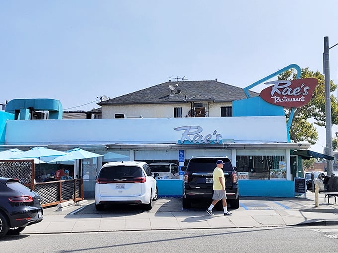 That turquoise and white facade might look humble, but inside lies breakfast magic waiting to happen.