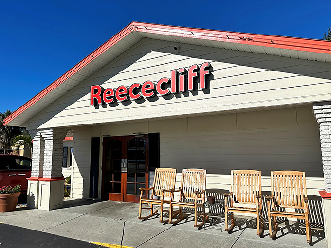 The unassuming exterior of Reececliff hides culinary treasures within, like finding a diamond mine disguised as a garden shed. Those rocking chairs aren't just for show!