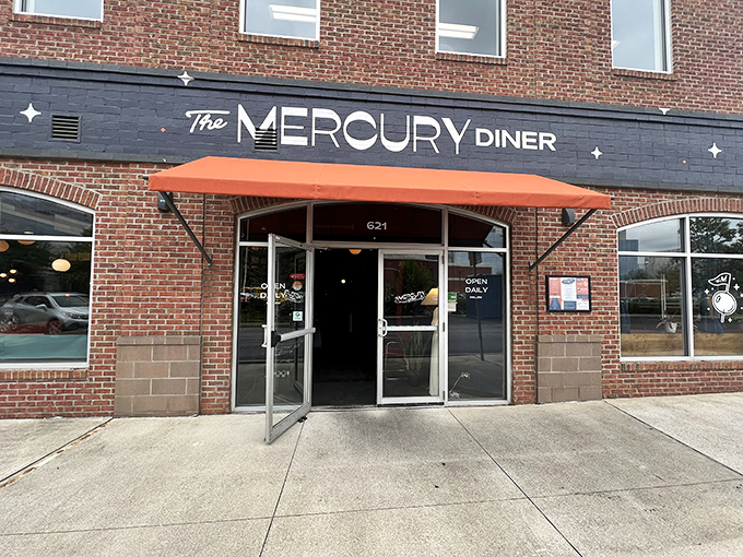 The brick-and-mortar promise of breakfast nirvana, complete with retro-futuristic signage that practically screams "pancakes await within!"