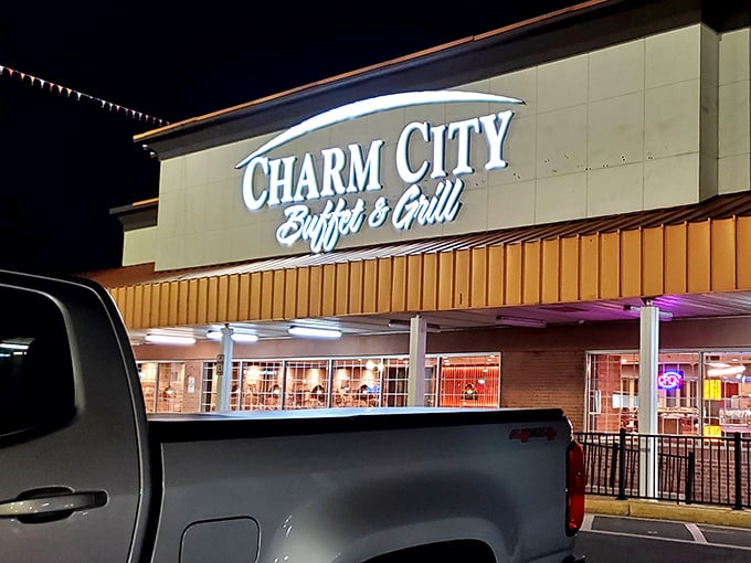 The gleaming sign against a blue Maryland sky promises what every hungry traveler seeks: unlimited culinary possibilities with a side of Old Bay seasoning.