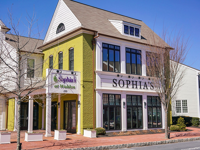 Sophia's sunny yellow exterior stands out like a cheerful beacon in Walden, promising culinary delights within those elegant columns and large windows.
