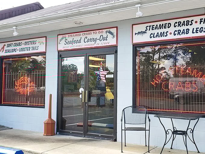 The seafood siren call of Crisfield! Those neon crab signs aren't just decoration—they're beacons guiding hungry Marylanders to their happy place.