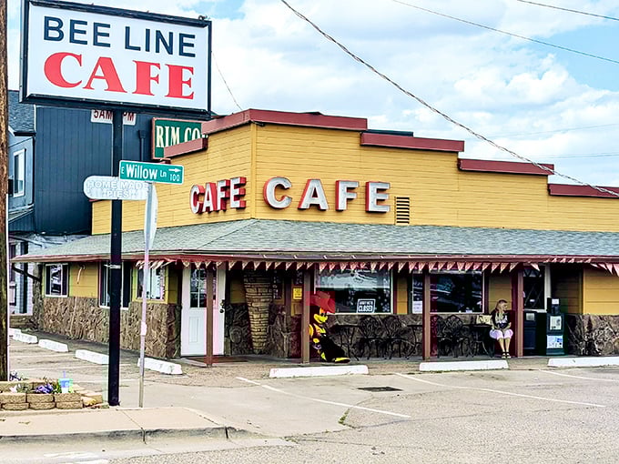 The bright yellow exterior with red trim isn't just eye-catching—it's a beacon of breakfast hope on the Beeline Highway. Classic Americana at its finest.