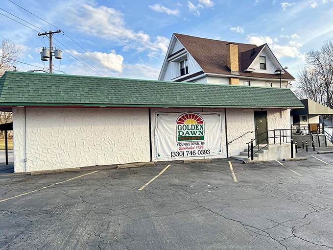 The unassuming exterior of Golden Dawn Restaurant in Youngstown hides culinary treasures that locals have treasured for generations. Some buildings don't need to shout.