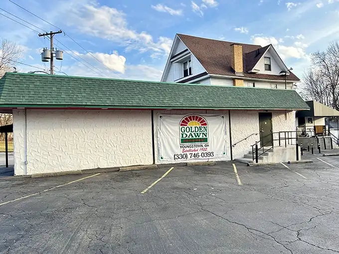 The unassuming exterior of Golden Dawn Restaurant in Youngstown hides culinary treasures that locals have treasured for generations. Some buildings don't need to shout.
