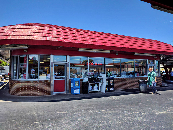 The iconic red-roofed exterior of Doumar's stands like a beacon of hope for hungry travelers—a Norfolk landmark that's seen more first dates than a high school guidance counselor.