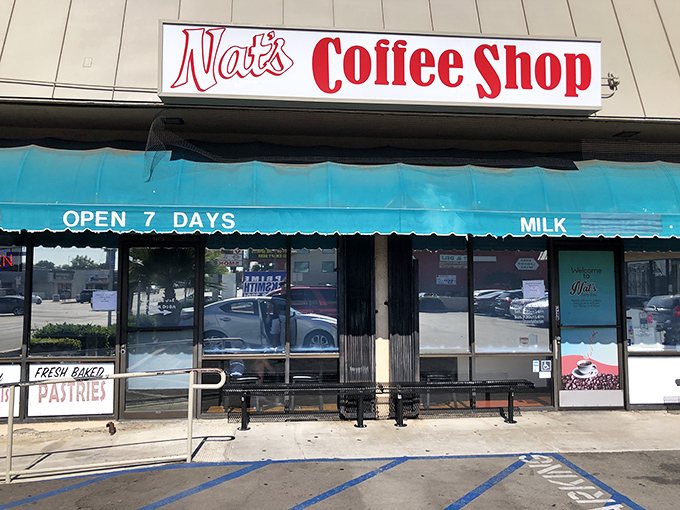 The blue awning and classic signage of Nat's Coffee Shop isn't trying to impress Instagram – it's too busy perfecting breakfast instead.
