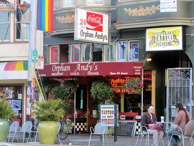 The Castro's 24-hour beacon of breakfast bliss beckons with its vintage Coca-Cola sign and cheerful planters—a neon-lit promise of comfort food at any hour.