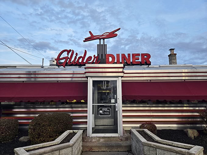 The iconic red glider airplane perched atop this classic Scranton diner isn't just decoration—it's a beacon calling hungry travelers home.