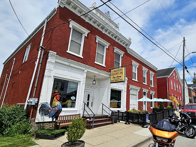 Wagner's Village Inn stands proudly in Oldenburg, where red brick meets culinary dreams and roosters announce greatness.