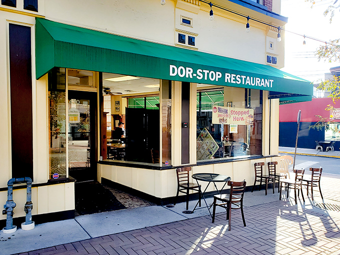 The iconic green awning of Dor-Stop beckons like an old friend. No fancy frills needed when the food inside speaks volumes.
