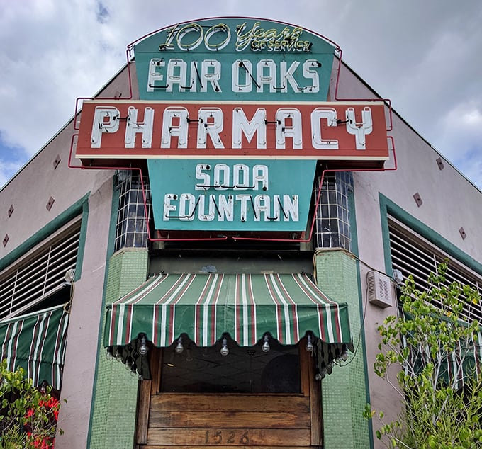 That corner building isn't just a pharmacy – it's a portal to when soda jerks ruled the world.
