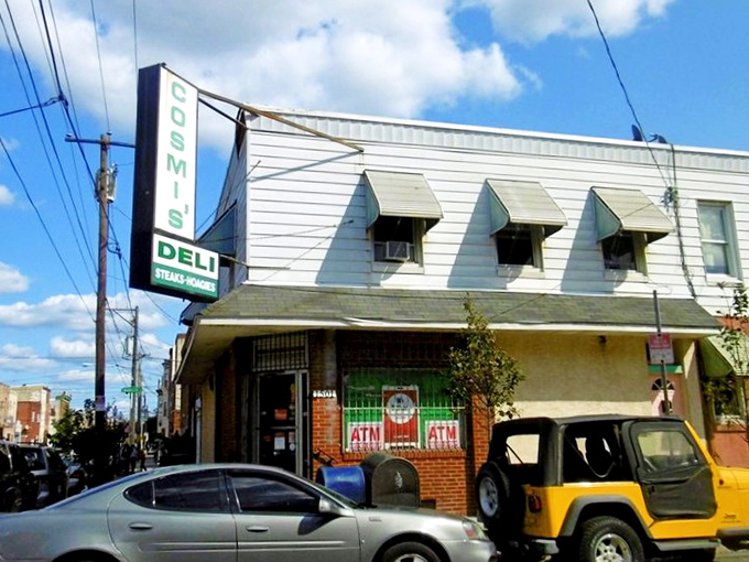 The unassuming white exterior of Cosmi's Deli hides culinary treasures within—like finding the Hope Diamond at a yard sale.