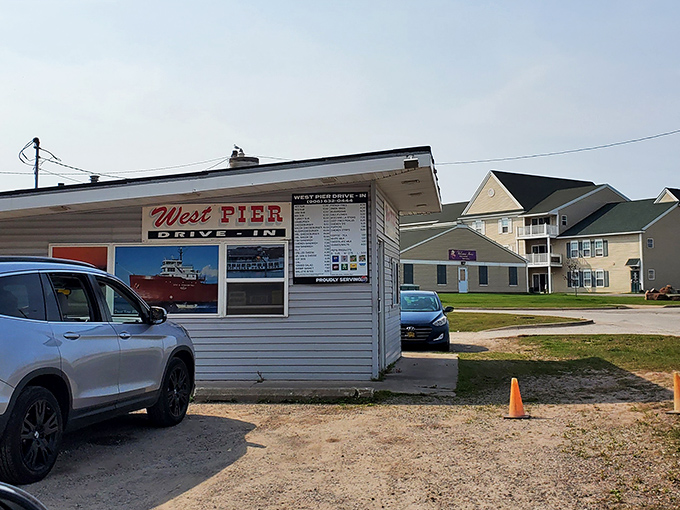 The unassuming exterior of West Pier Drive-In stands like a culinary lighthouse in Sault Ste. Marie, promising simple pleasures done extraordinarily well.