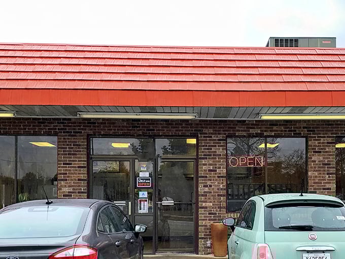 The unassuming brick exterior with its signature orange-red roof has been Florence's best-kept culinary secret for decades. No Instagram filters needed here—just honest food and community.