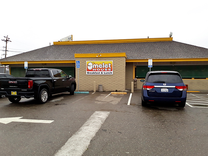 The unassuming exterior of Omelet House proves once again that California's best breakfast treasures often hide behind modest facades. Yellow trim promises sunny experiences inside.