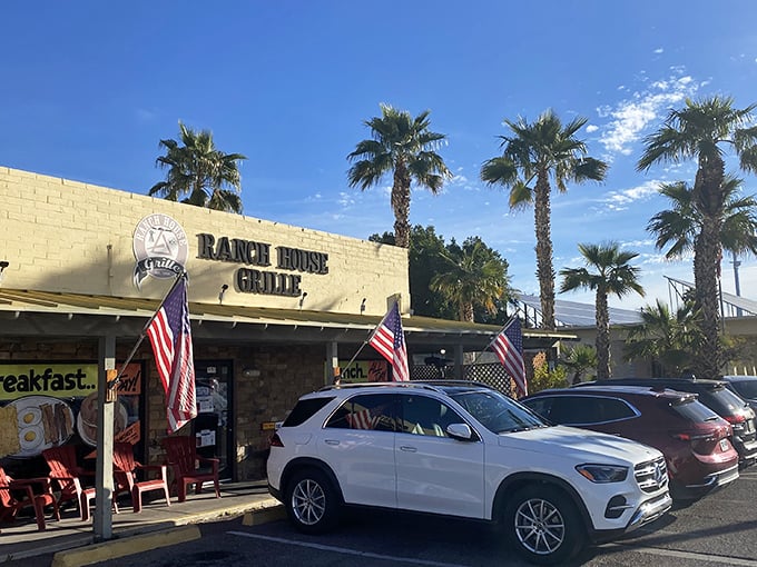 The stone facade and American flags of Ranch House Grille stand as a beacon for hungry Phoenicians, promising hearty meals that'll fuel desert adventures.