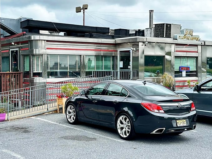 The gleaming stainless steel exterior of Route 30 Diner shines like a beacon for hungry travelers, promising classic American comfort in every bite.