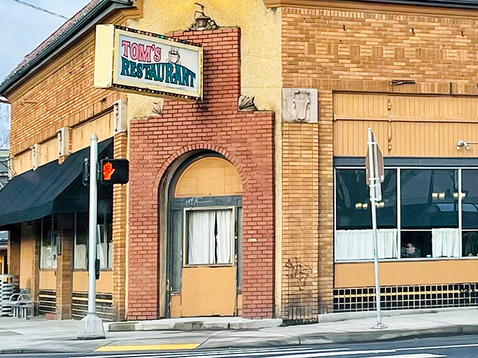 The corner brick building with its vintage signage stands as a Portland landmark, promising honest food without the hipster fanfare.
