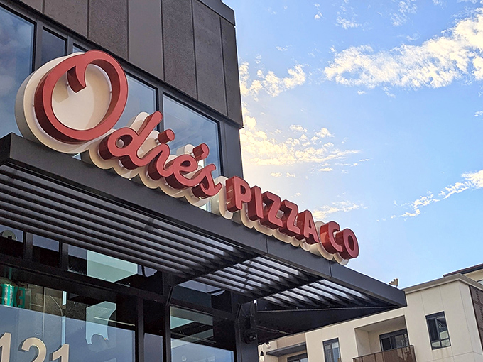 Modern meets mouthwatering at Odie's corner location in Oceanside, where that bold red signage practically screams "pizza paradise awaits inside!"