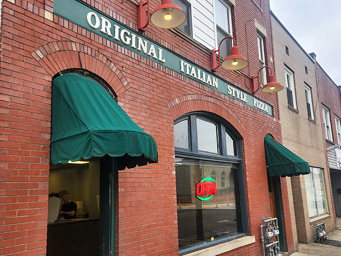 The iconic brick facade of Police Station Pizza stands as a testament to pizza history in Ambridge – simplicity and tradition in architectural form.