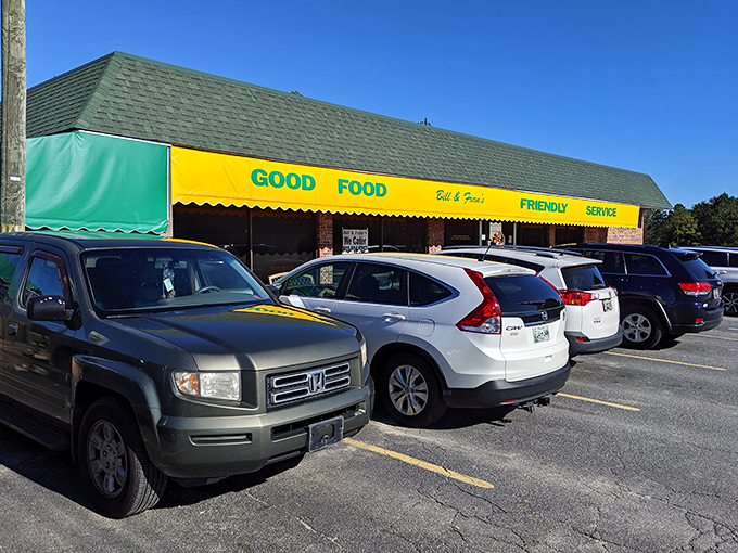 That bright yellow awning isn't just a sign—it's a beacon of breakfast hope promising "Good Food" and "Friendly" service. Truth in advertising at its finest.