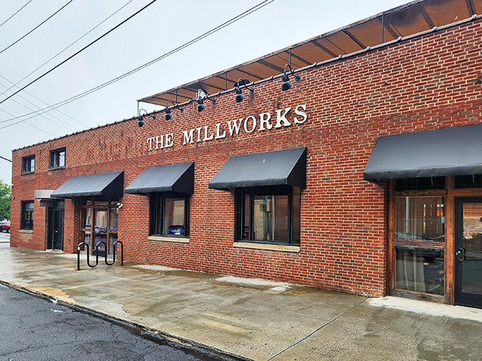 The brick facade of The Millworks stands proudly in Harrisburg, a testament to Pennsylvania's industrial past reimagined for our culinary present.