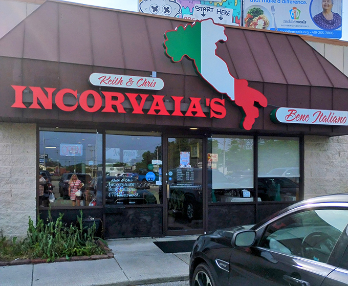 The iconic red Incorvaia's sign with Italy's boot silhouette promises authentic flavors before you even step through the door.