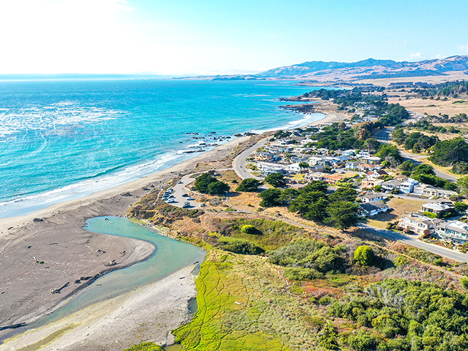 Cambria's coastline looks like Mother Nature showing off her best work—turquoise waters meeting golden shores under California's impossibly blue skies.