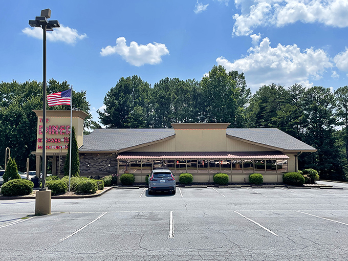 The humble exterior hides culinary treasures within, like Clark Kent's glasses concealing Superman. This unassuming building houses Georgia comfort food magic.