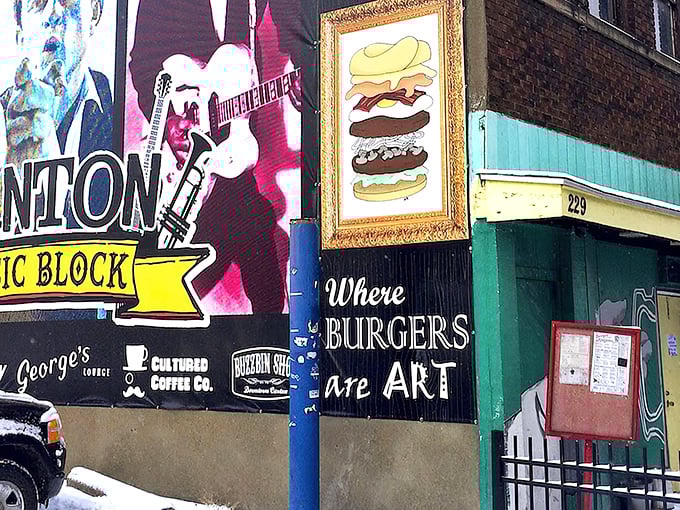 The emerald facade of George's Lounge stands out in Canton's arts district like a culinary beacon, complete with wolf mural and the promise of delicious adventures within.