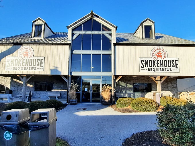The cream-colored exterior with its striking blue metal roof stands like a barbecue beacon in Amish country, promising smoky delights within.